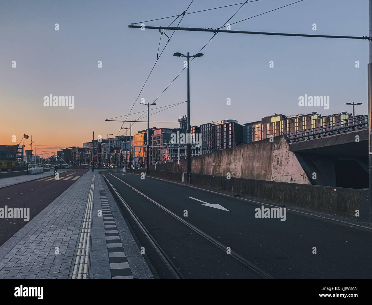 An outdoor view of old buildings in the early morning in the city of ...