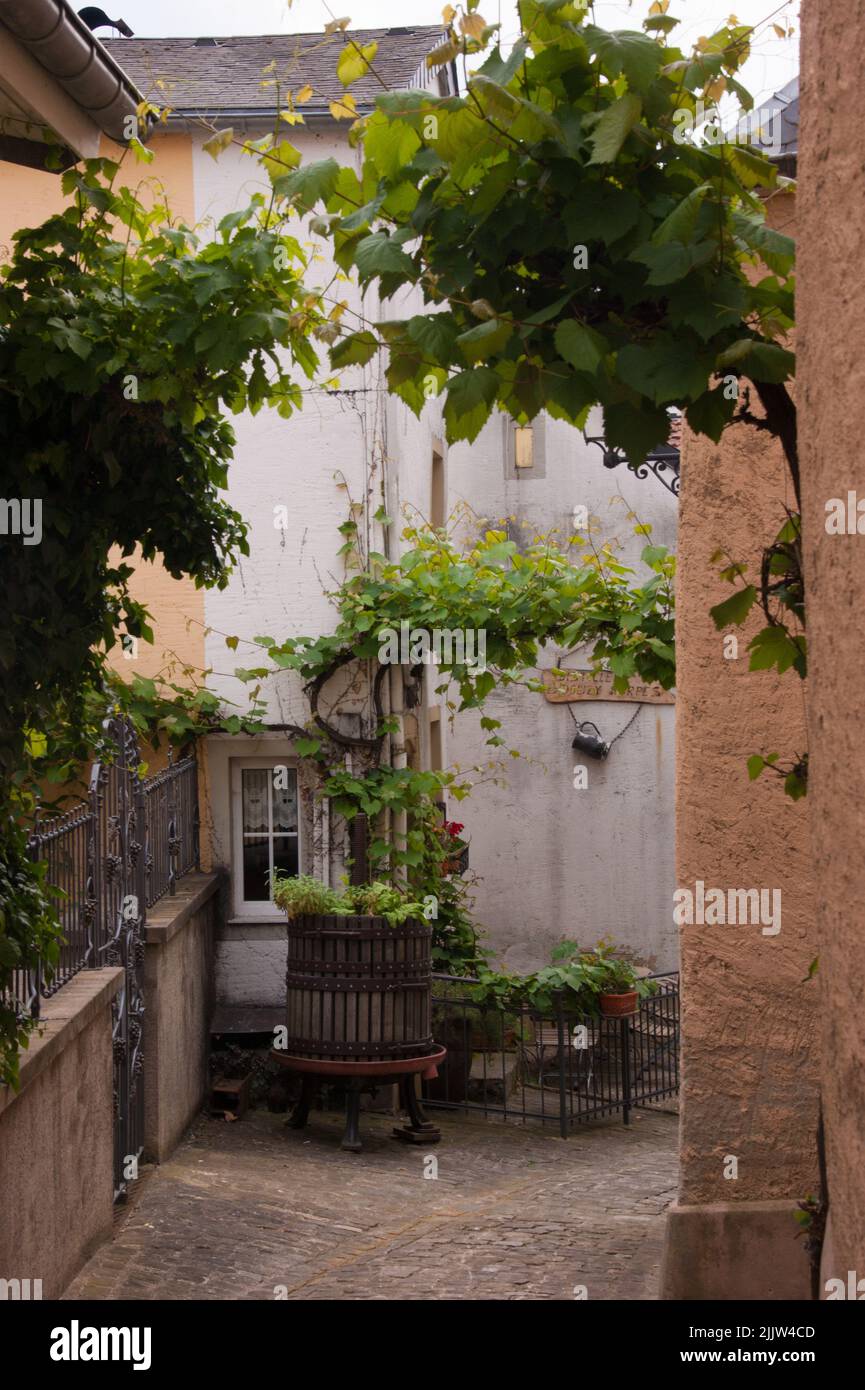 A vertical shot of a small corner between houses in the town of Ehnen ...