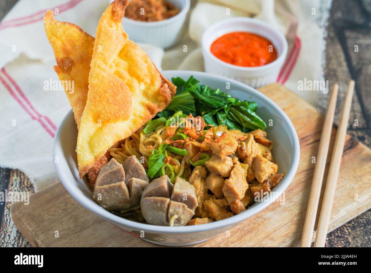 Indonesian street food, mie ayam bakso, noodles with chicken and served ...