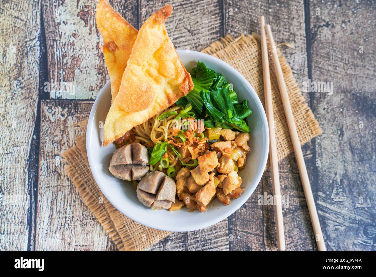 Indonesian street food, mie ayam bakso, noodles with chicken and served ...
