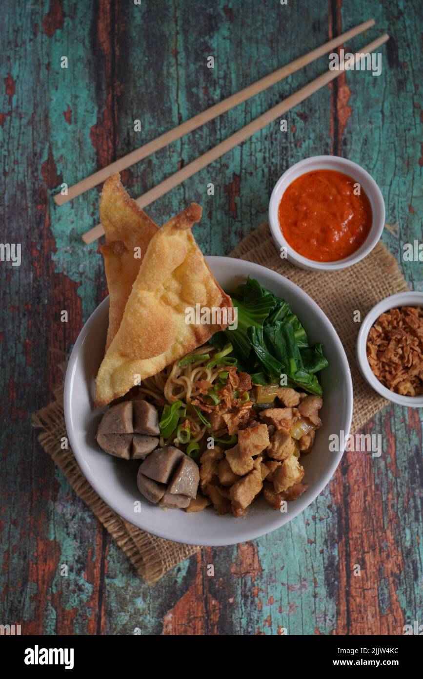 Indonesian street food, mie ayam bakso, noodles with chicken and served ...