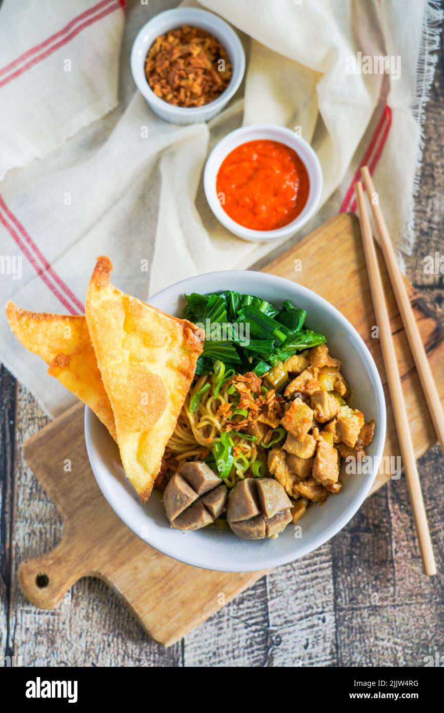 Indonesian street food, mie ayam bakso, noodles with chicken and served ...