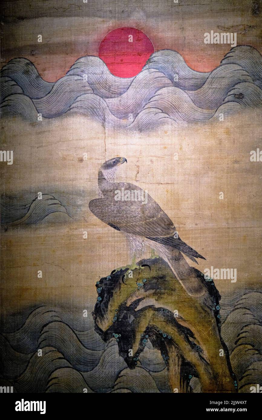 South Korea, Seoul, Yongsan-gu, National Museum, falcon on a rock at ...