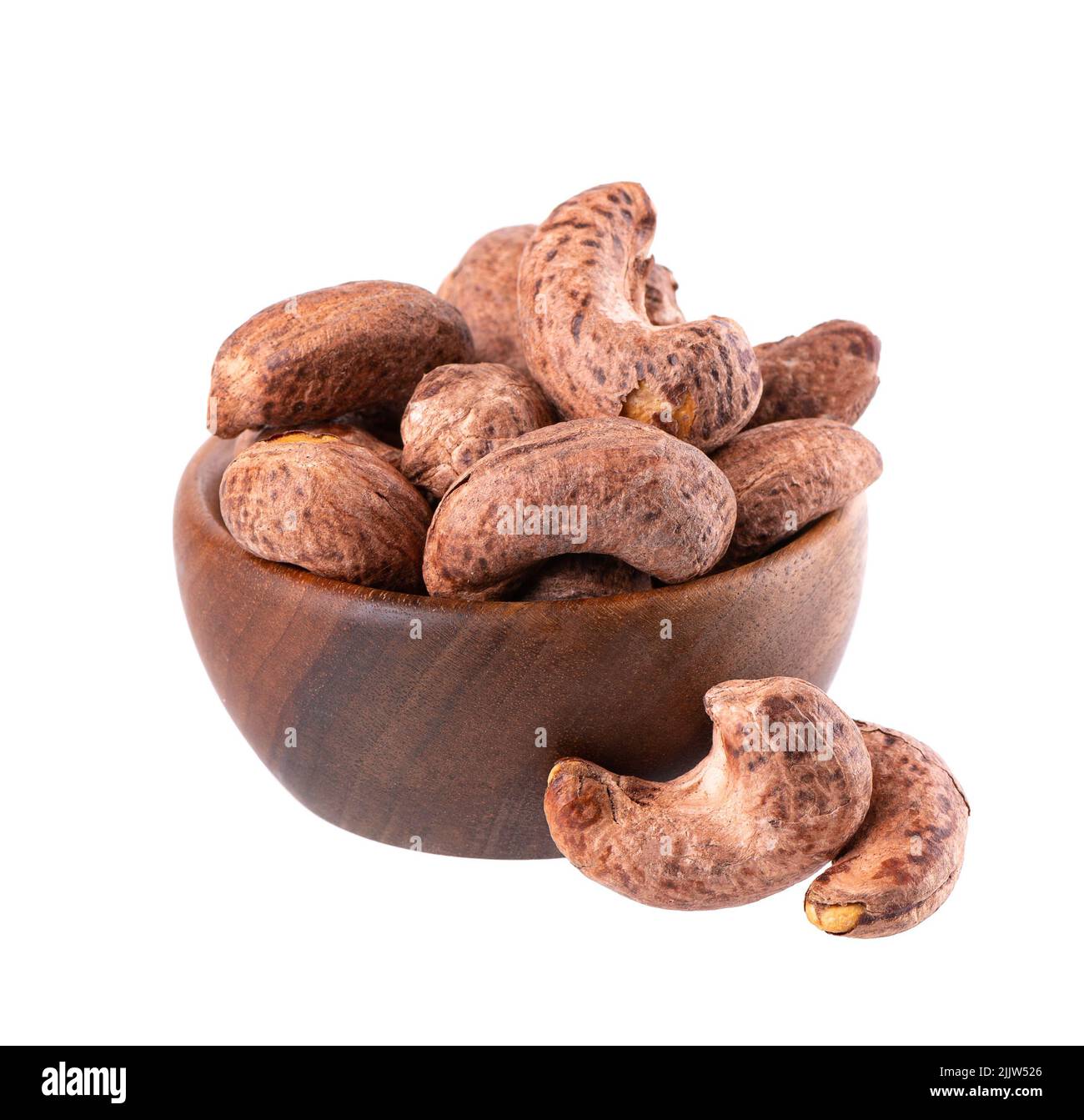 Cashew nuts in shell in wooden bowl, isolated on white background ...