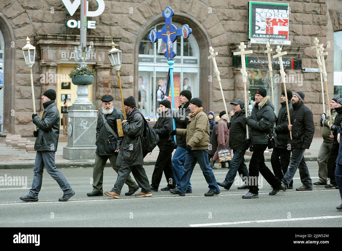Group of men only carrying wooden crosses marching on the Hreshchatyk ...