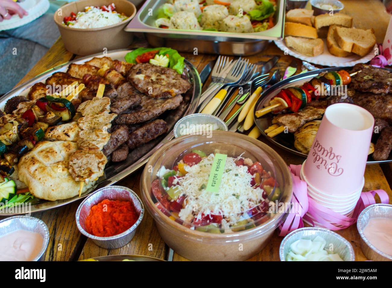 A close-up shot of a prepared table full of yummy meals for a party ...