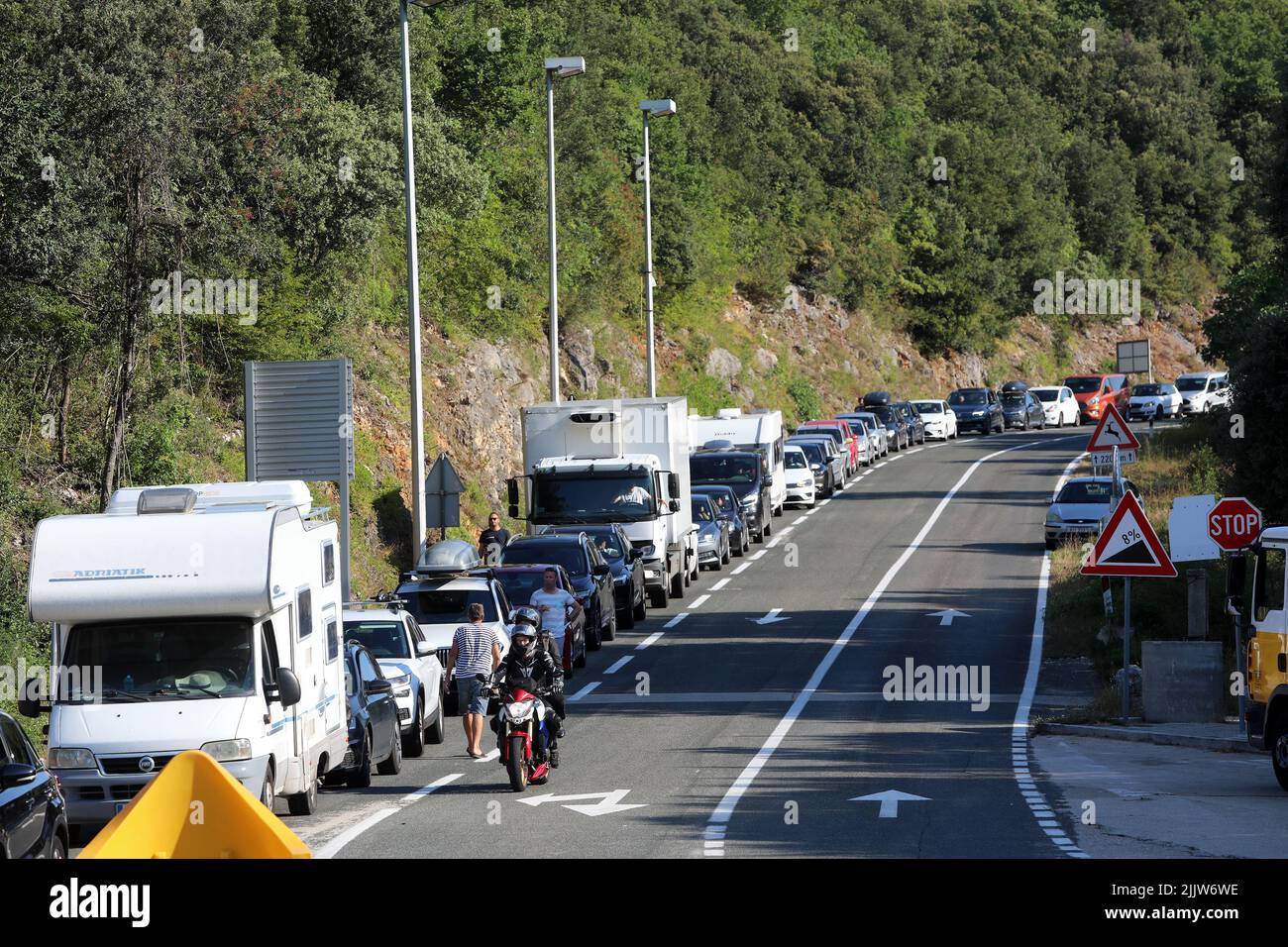 Tourists board the Jadrolinija Kornati and Ilovik ferries at the ...