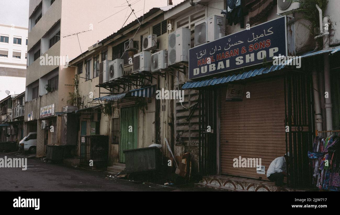 A back alley with stores and old buildings in Bandar Seri Begawan ...