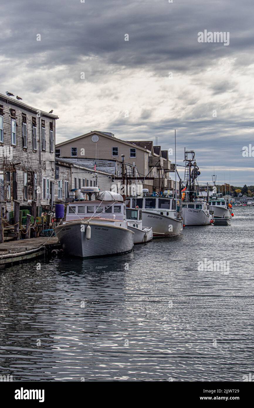 A line of lobster fishing boats moored in harbor Stock Photo - Alamy