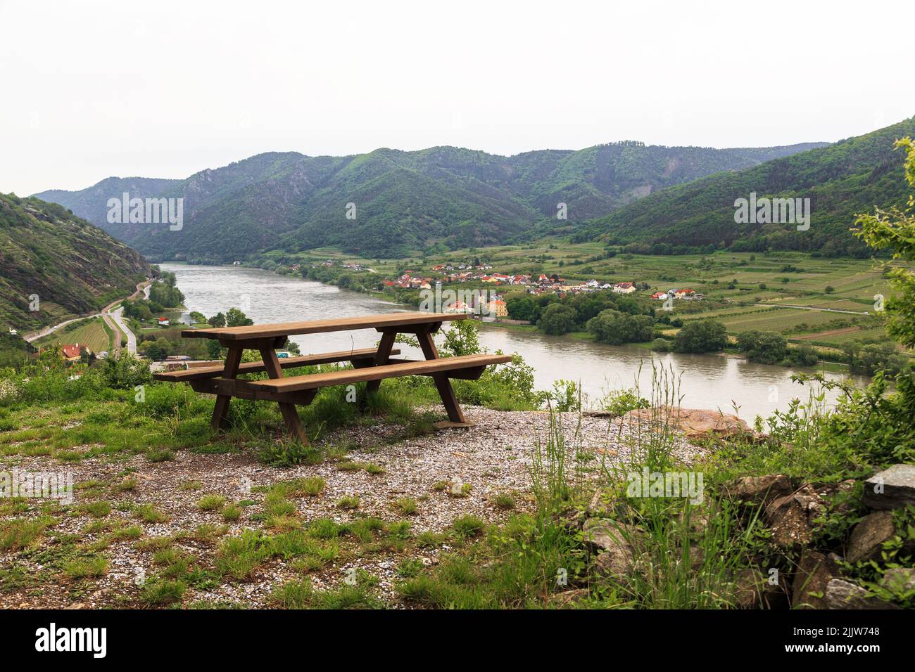 SPITZ, AUSTRIA - MAY 13, 2019: This is a bench with table to rest on a ...