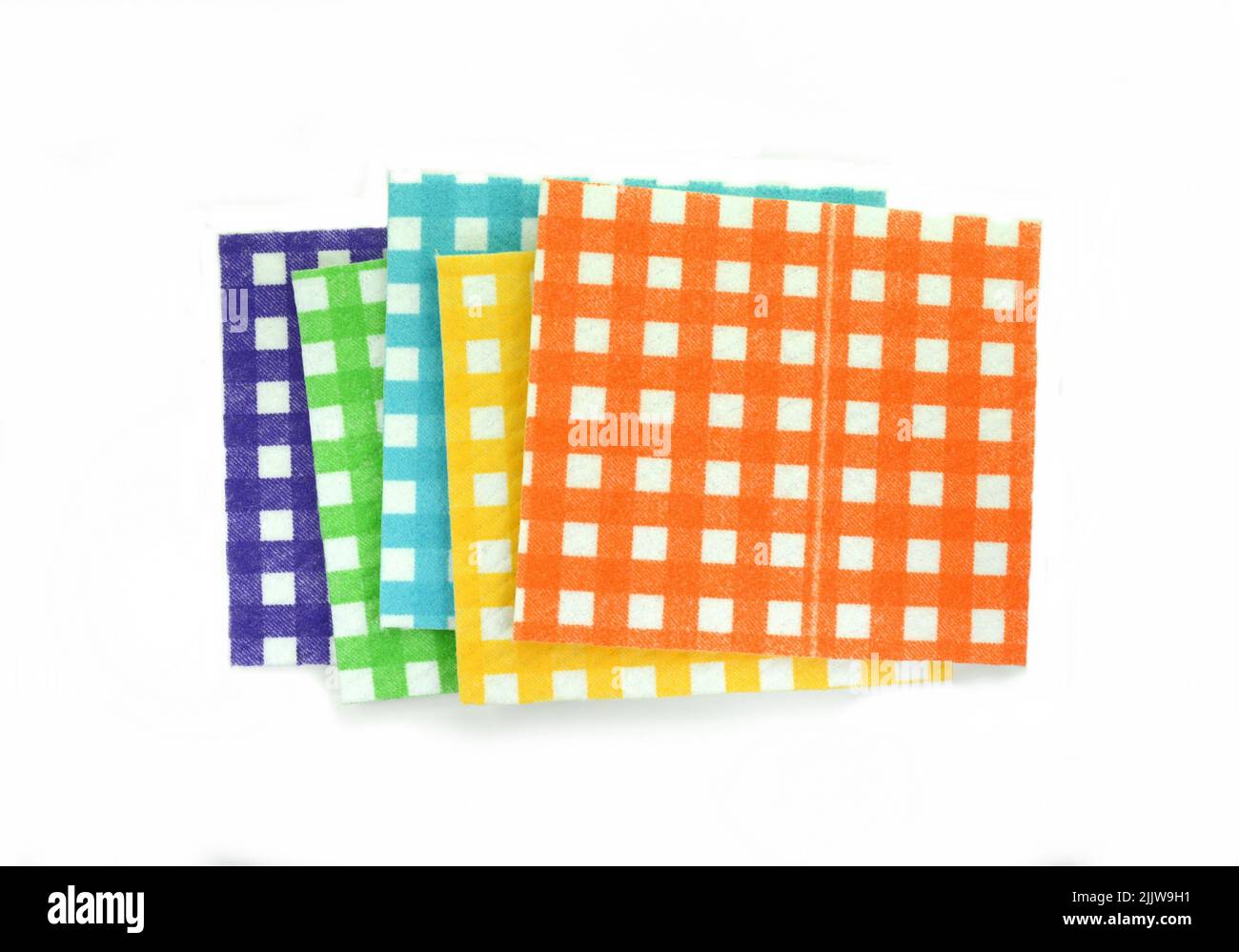 Clean sponge cloths with a checkered pattern isolated on white ...