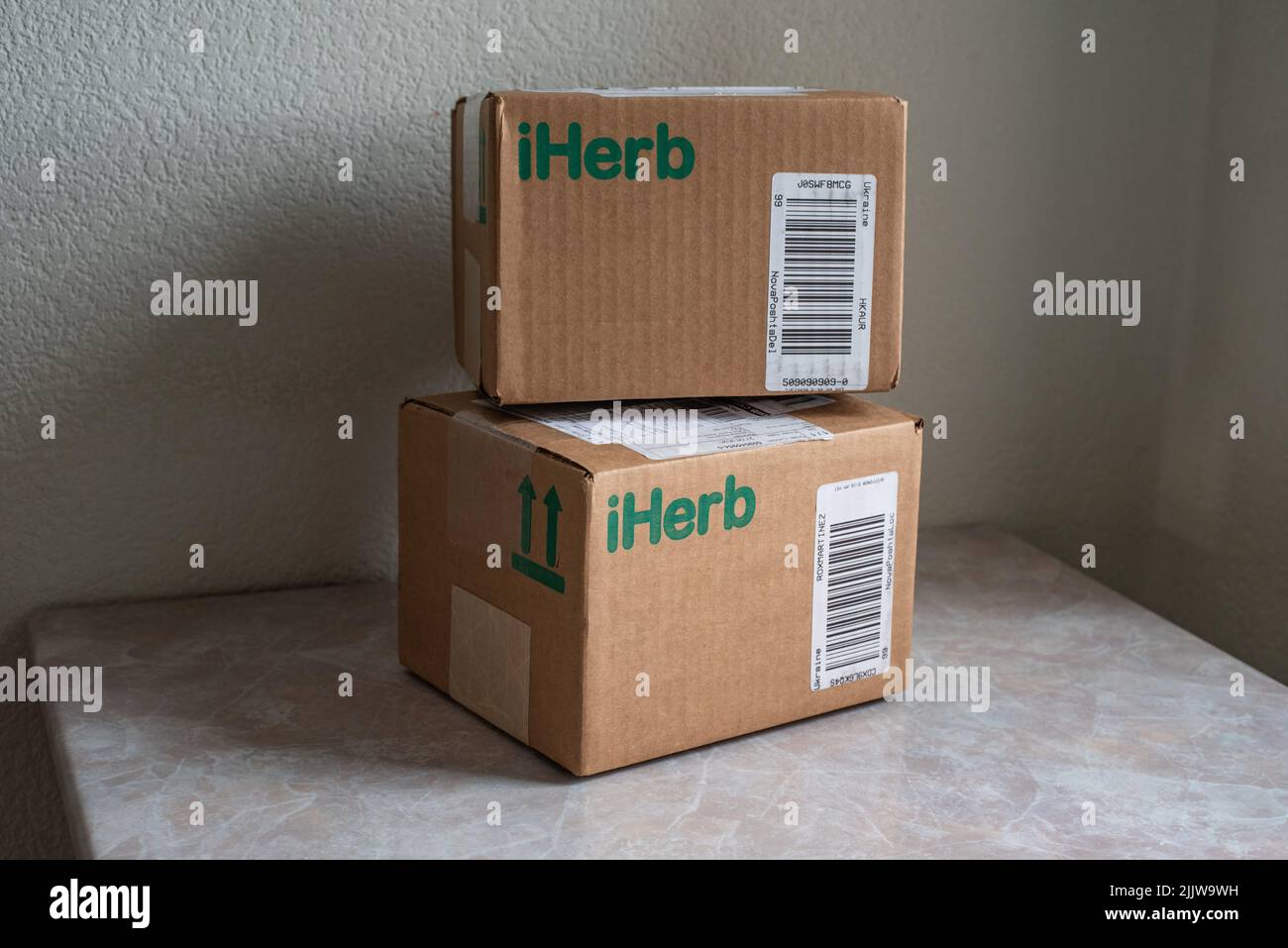 Kyiv, Ukraine - July 13, 2020 : The package of Iherb with vitamins ...