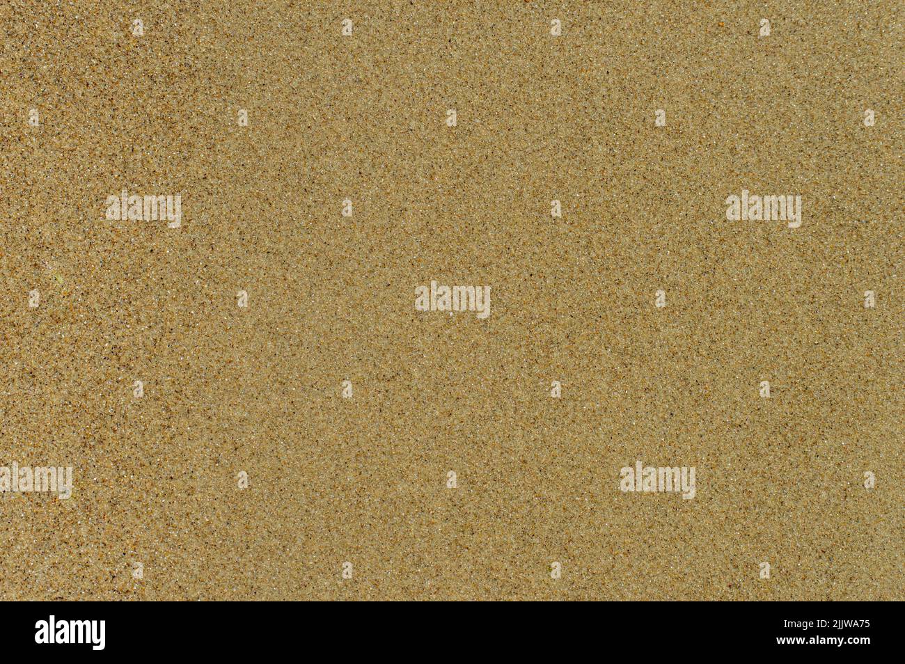 Gold sand background, nature materials, close-up Stock Photo - Alamy