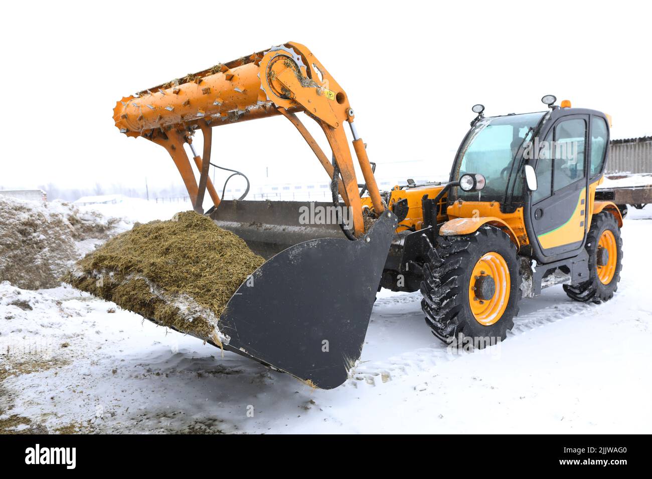 Bucket with Emily mobile cutter. Selection of silage and haylage from ...