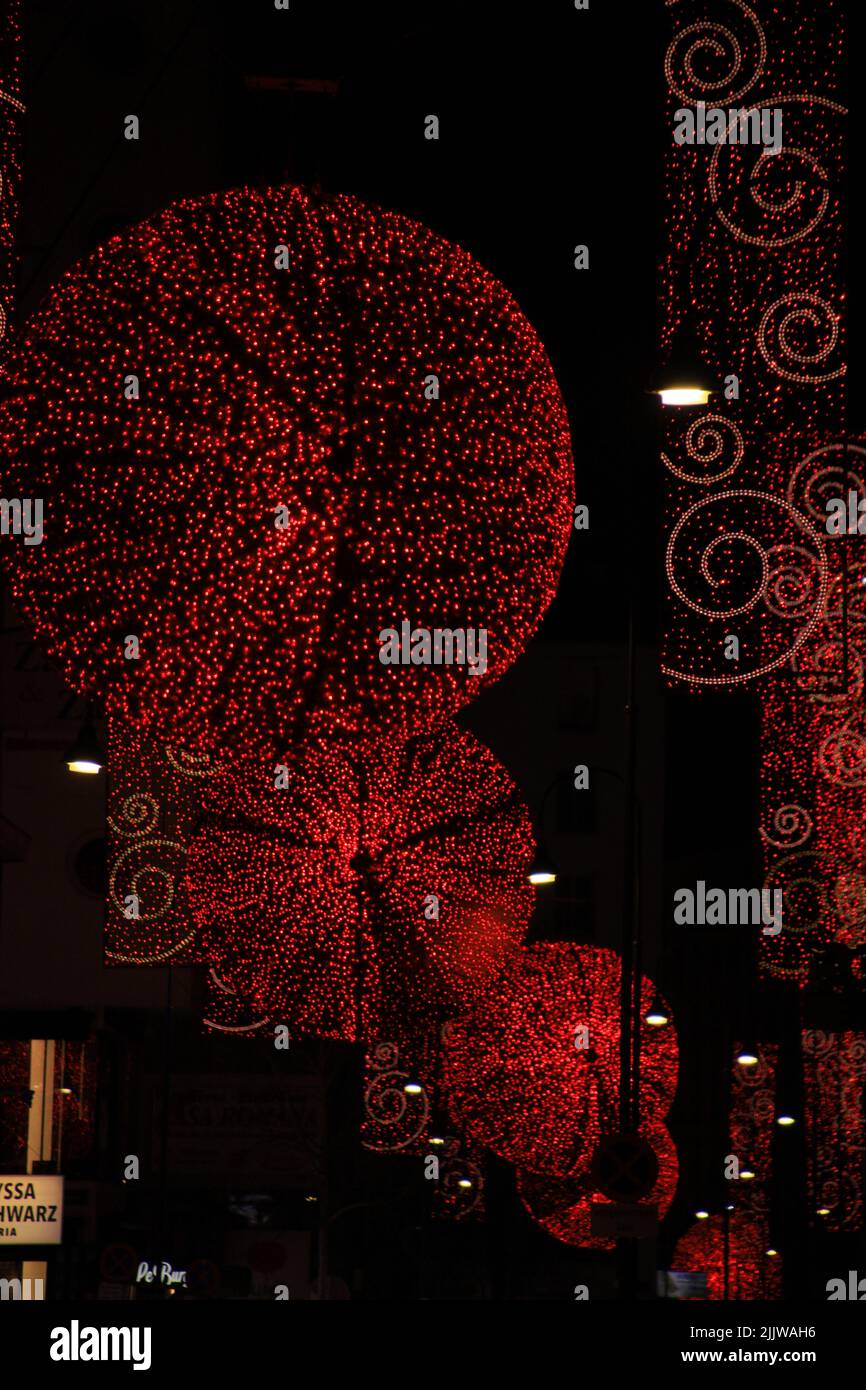 The Xmas in Vienna with its beautiful street decoration showing big red ...