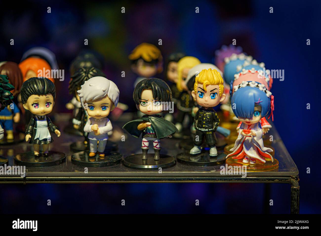 A number of Anime B-Side collectible figures in a store on a blurred ...