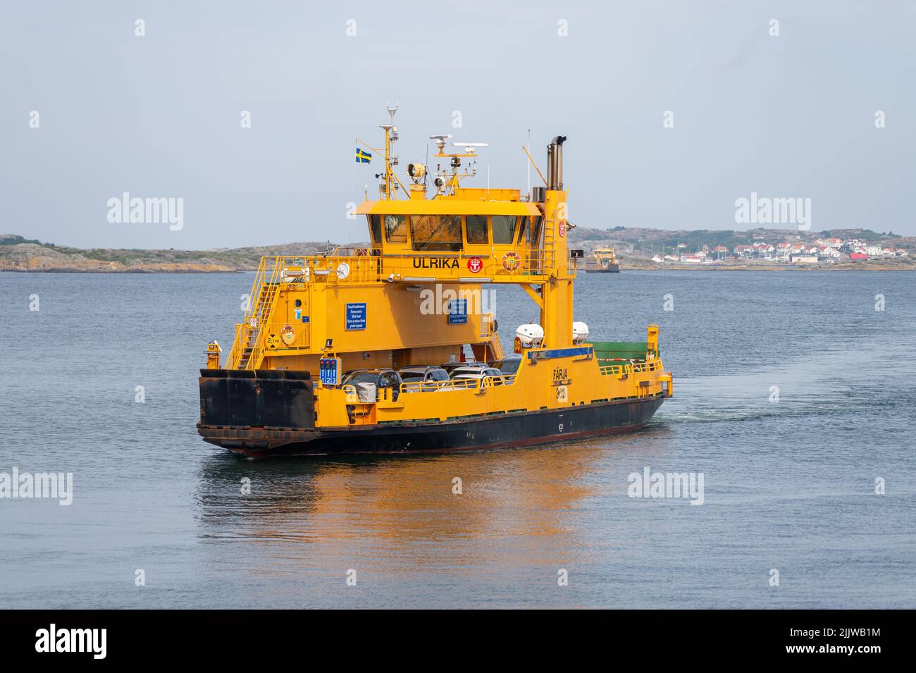 Yellow ferry for passengers, cars and other vehicles. Transportation ...