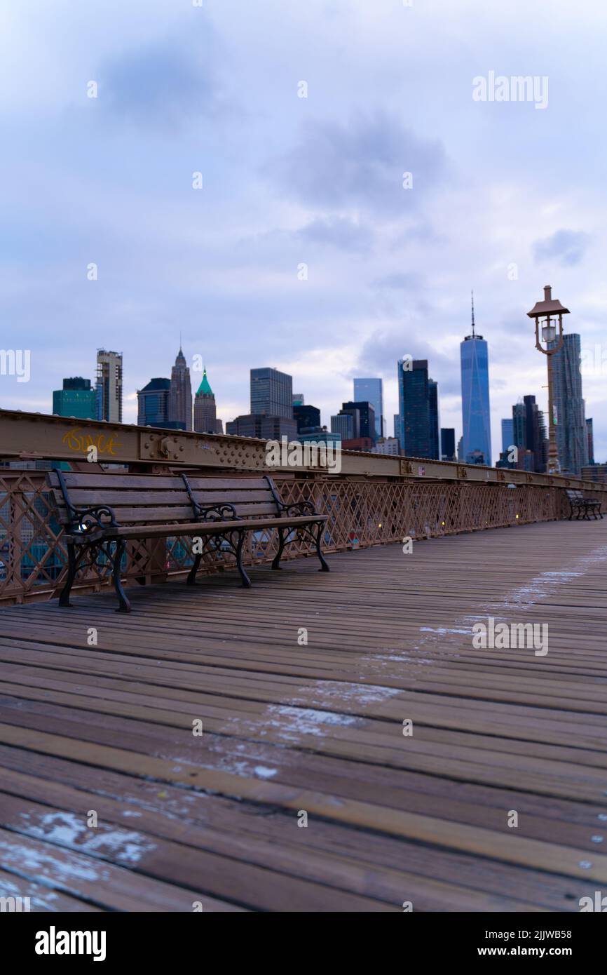 A vertical shot of cityscape New York from Brooklyn bridge Stock Photo ...