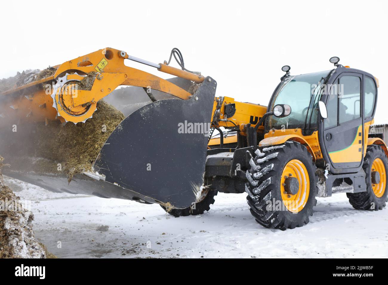 Bucket with Emily mobile cutter. Selection of silage and haylage from ...