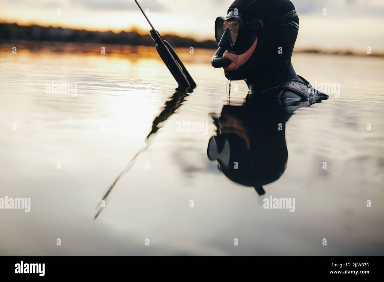 Diver using a harpoon hi-res stock photography and images - Alamy