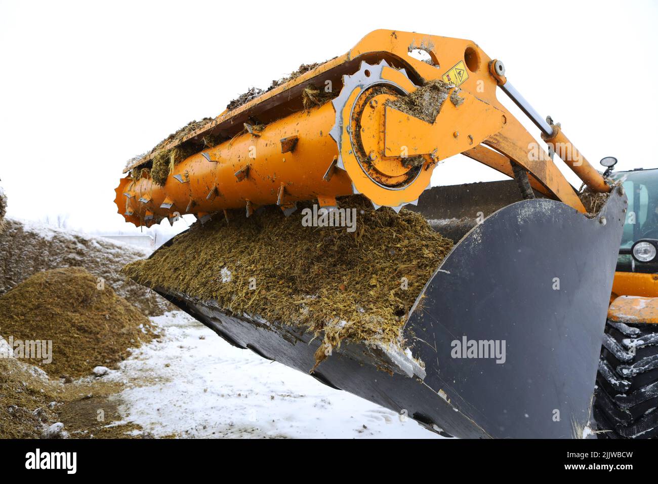 Bucket with Emily mobile cutter. Selection of silage and haylage from ...