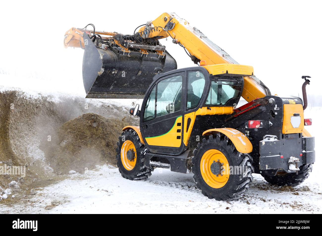 Bucket with Emily mobile cutter. Selection of silage and haylage from ...