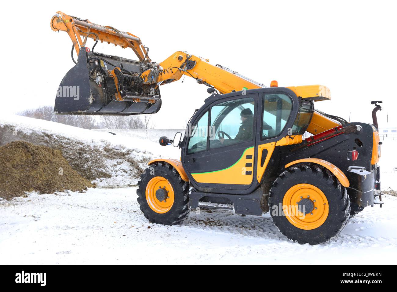 Bucket with Emily mobile cutter. Selection of silage and haylage from ...