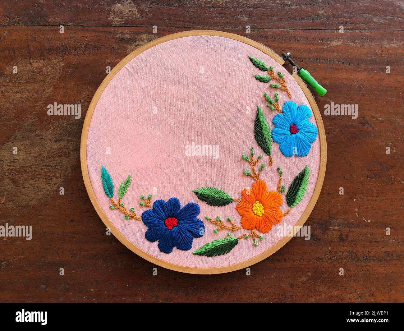 Hand embroidery cross stitch flower ornament hi-res stock photography ...