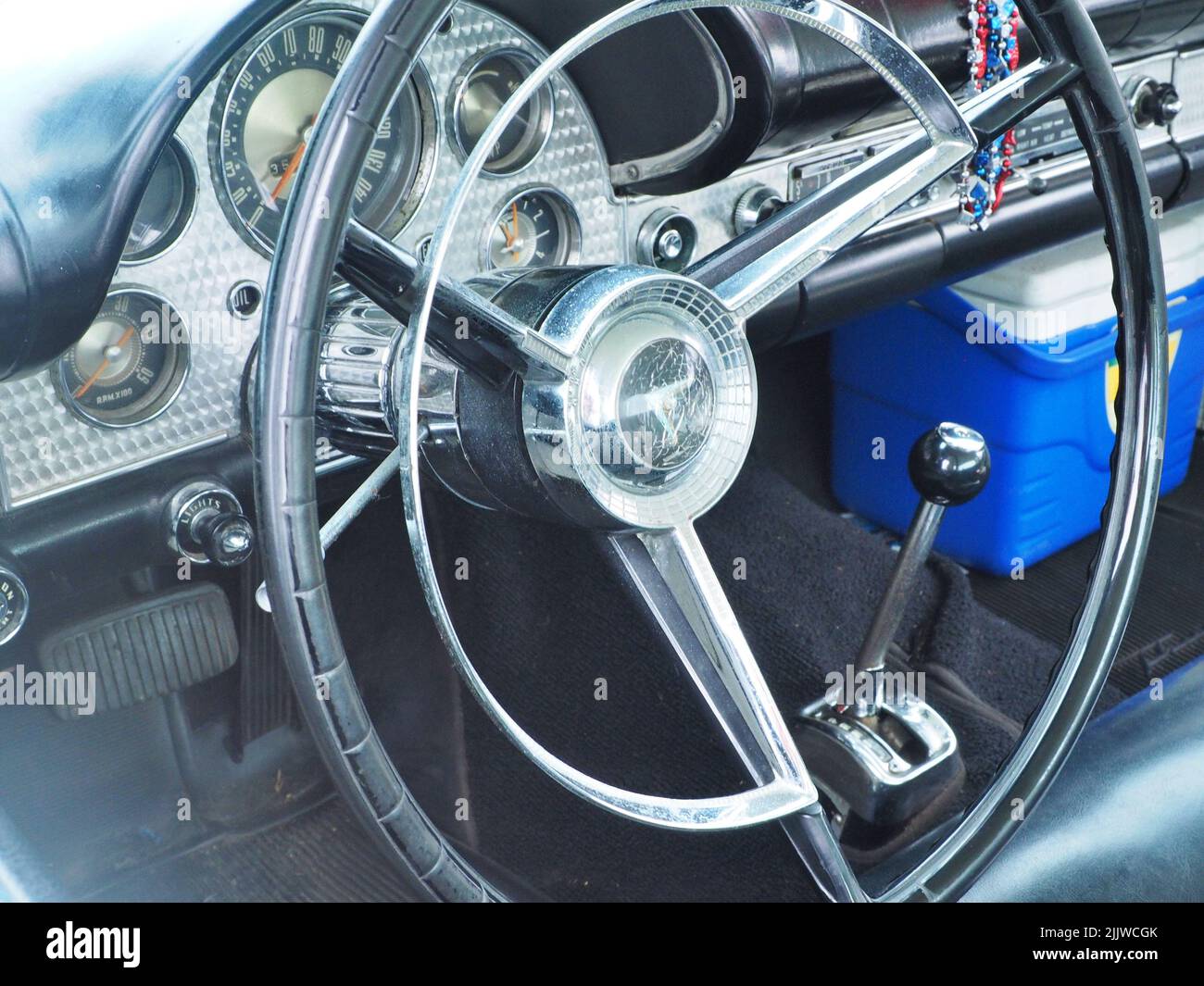 The close-up view of the black Ford classic car wheel Stock Photo - Alamy