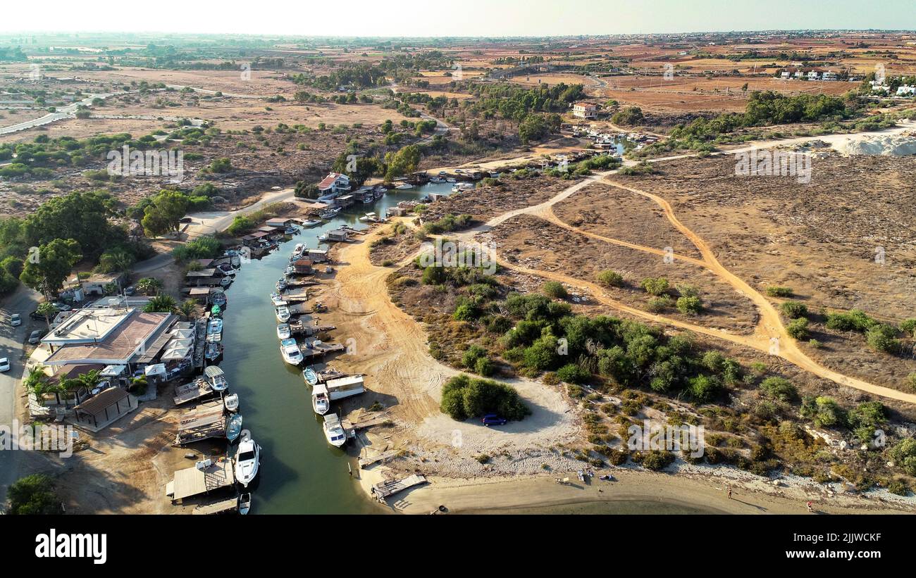 Aerial bird's eye view of Liopetri river to the sea (potamos Liopetriou ...