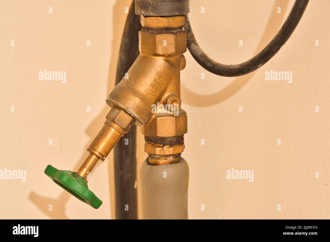 dusty water pipe shut-off valve, house connection Stock Photo - Alamy