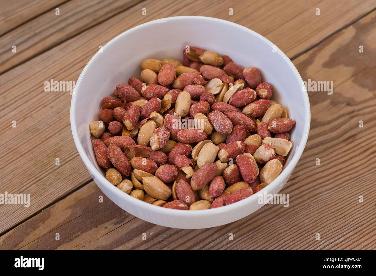 Salted peanuts. The peanut is a nut of high nutritional value, very ...