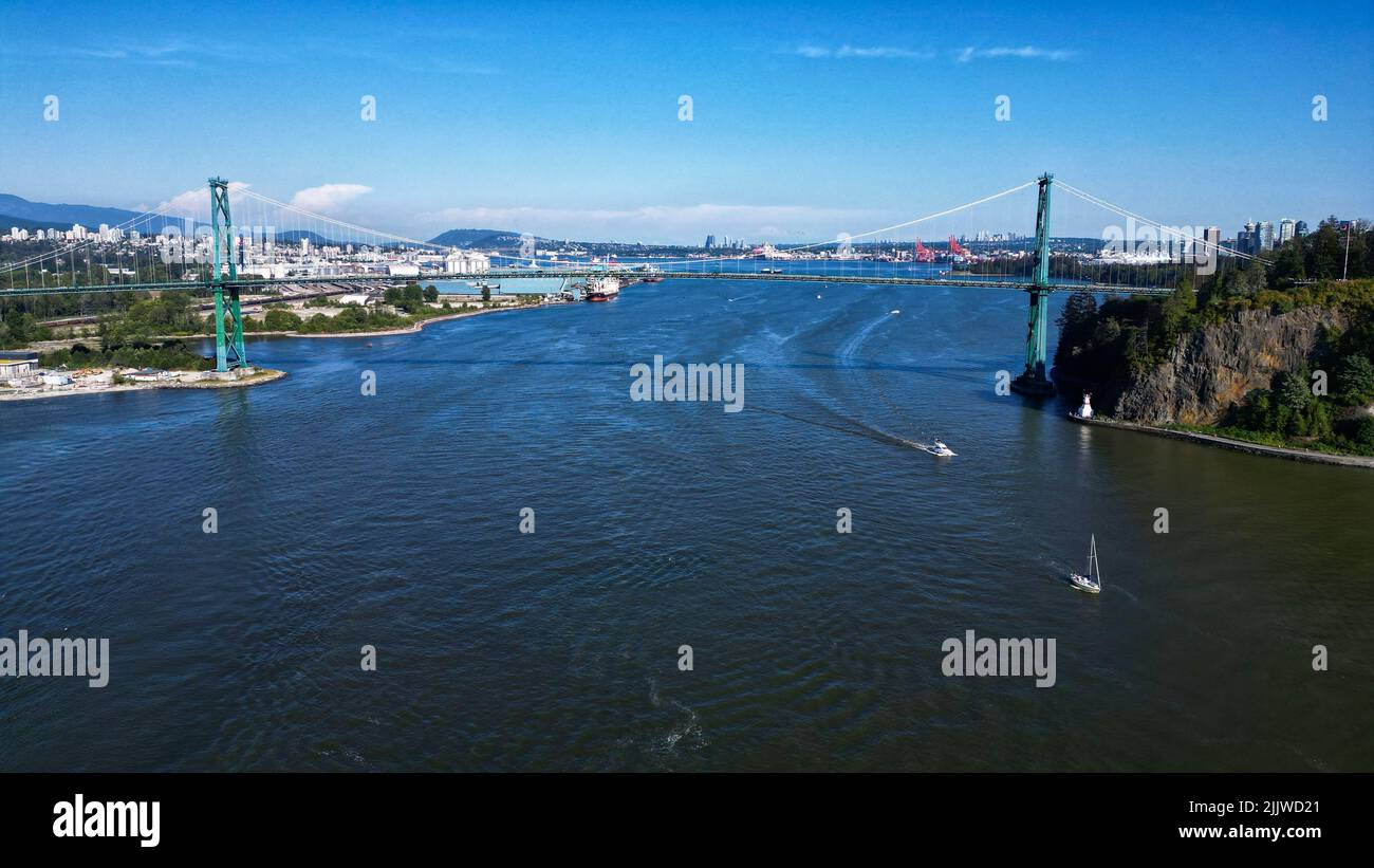 The aerial view of Lions gate bridge over the English bay in Vancouver ...