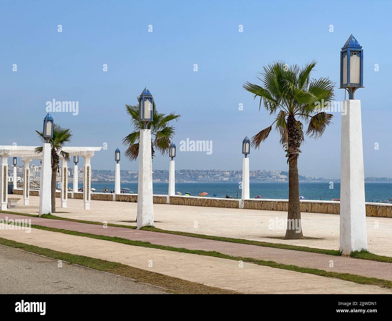 Empty street alongside the seaside in Morocco Stock Photo - Alamy