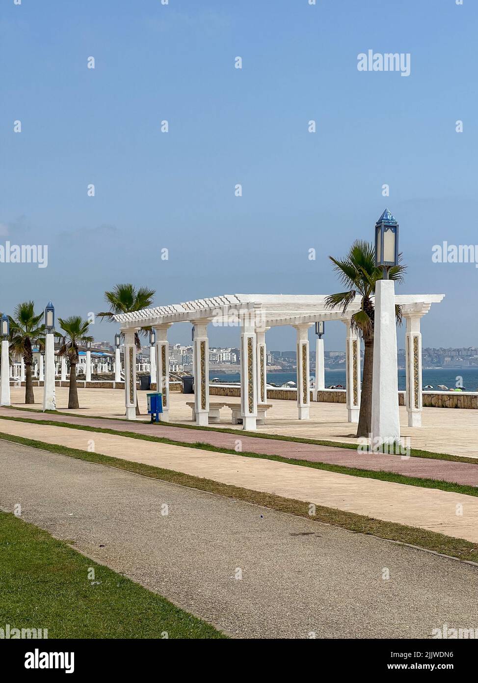 Empty street alongside the seaside in Morocco Stock Photo - Alamy
