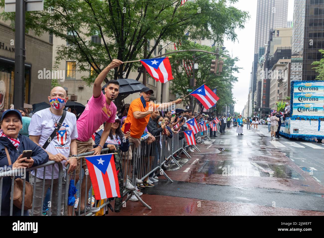Excited people celebrating the Puerto Rican Day Parade in New York City ...