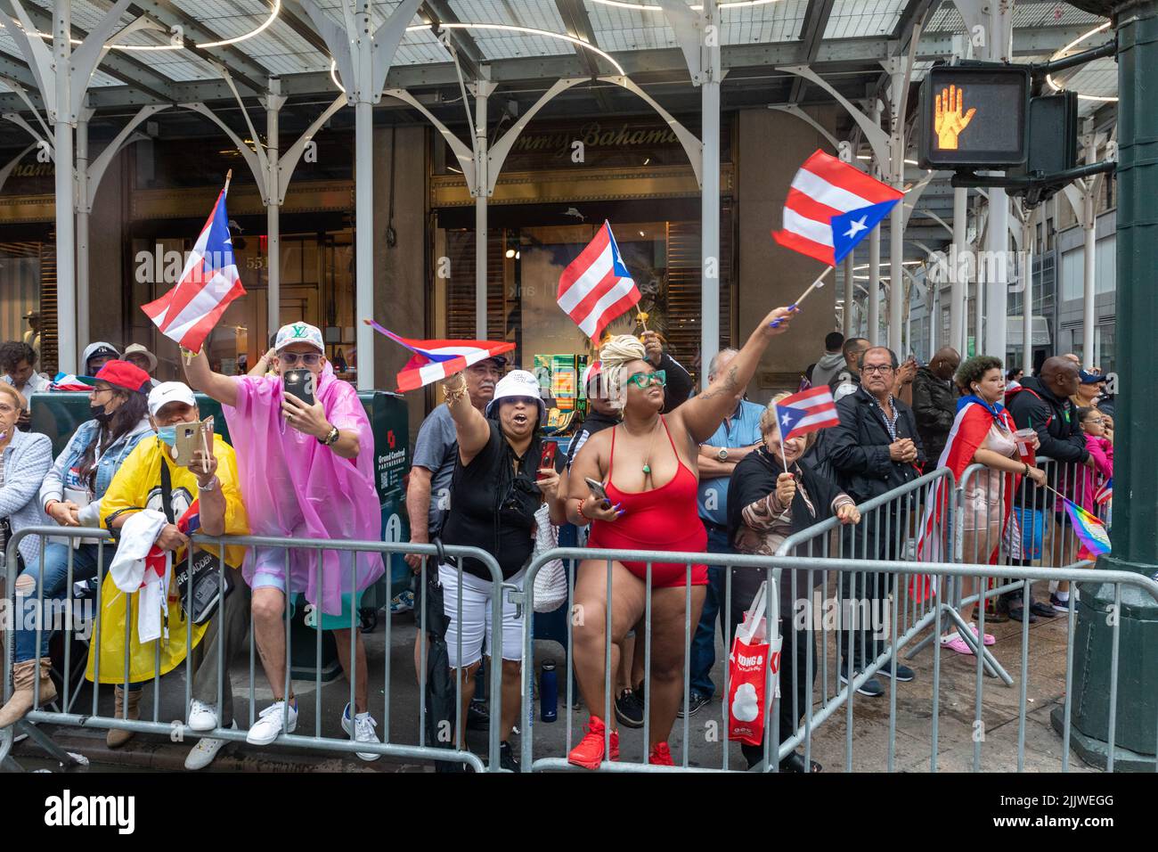 Excited people celebrating the Puerto Rican Day Parade in New York City ...