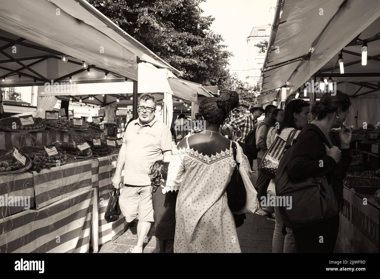 PARIS, FRANCE - JUNE 24, 2018: People shopping at open air organic ...