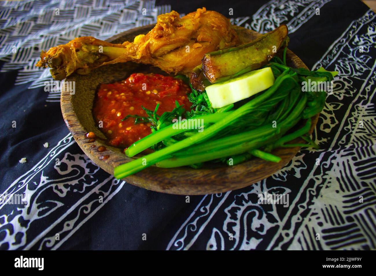 nasi tempong or sego tempong is traditional food from banyuwangi ...