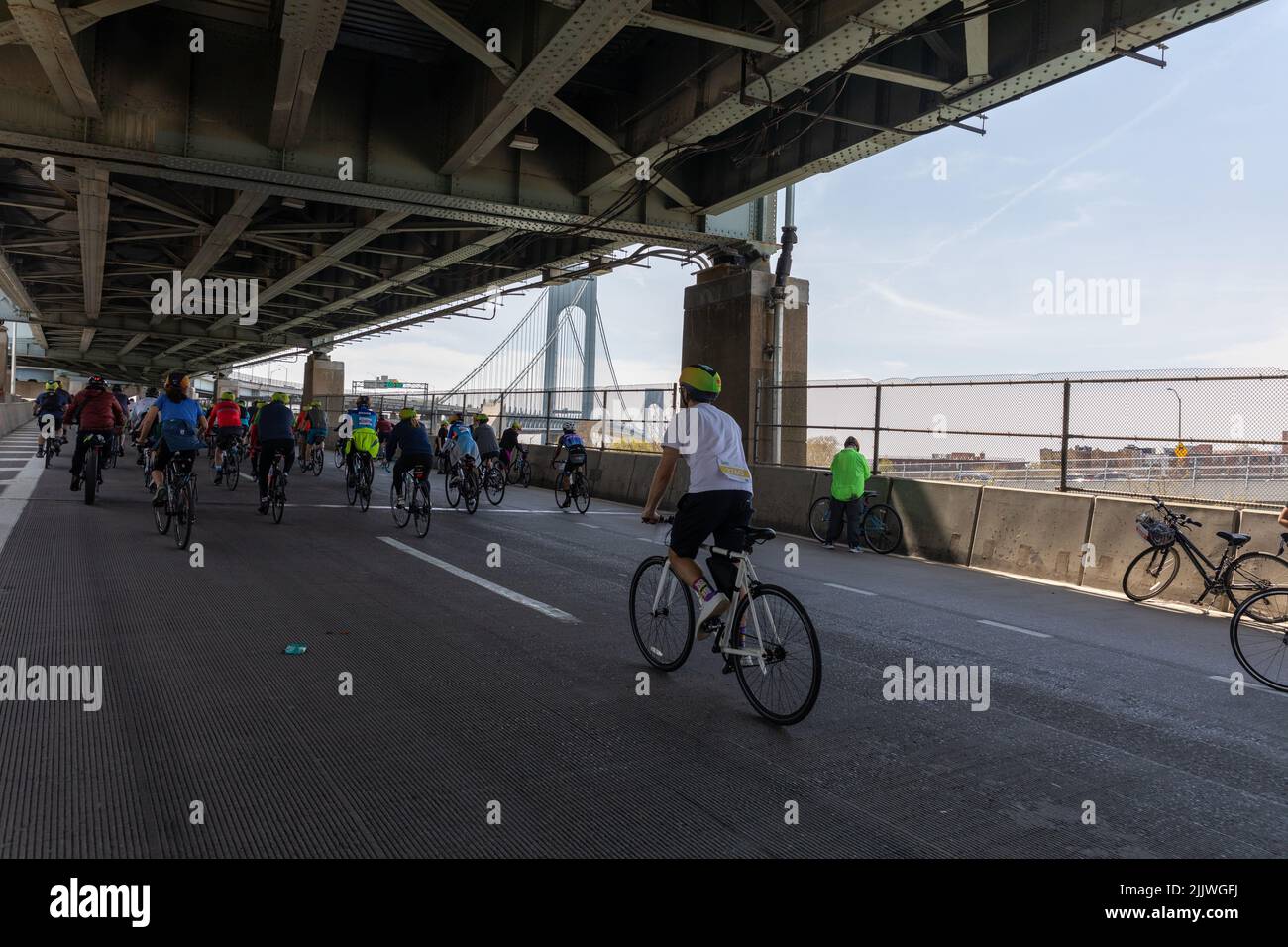 A closeup shot of bikers participating in the Five Boro Bike tour in ...