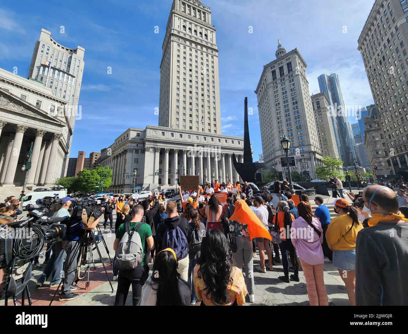 A crowd holding a cardboard sign Foley Square, New York, USA Stock ...