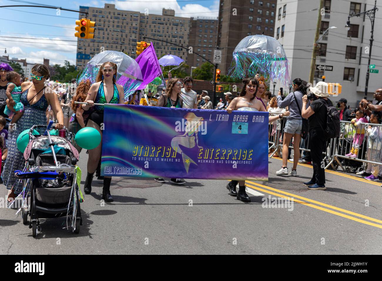 A shot of two young women with a poster dedicated to the 40th Annual ...