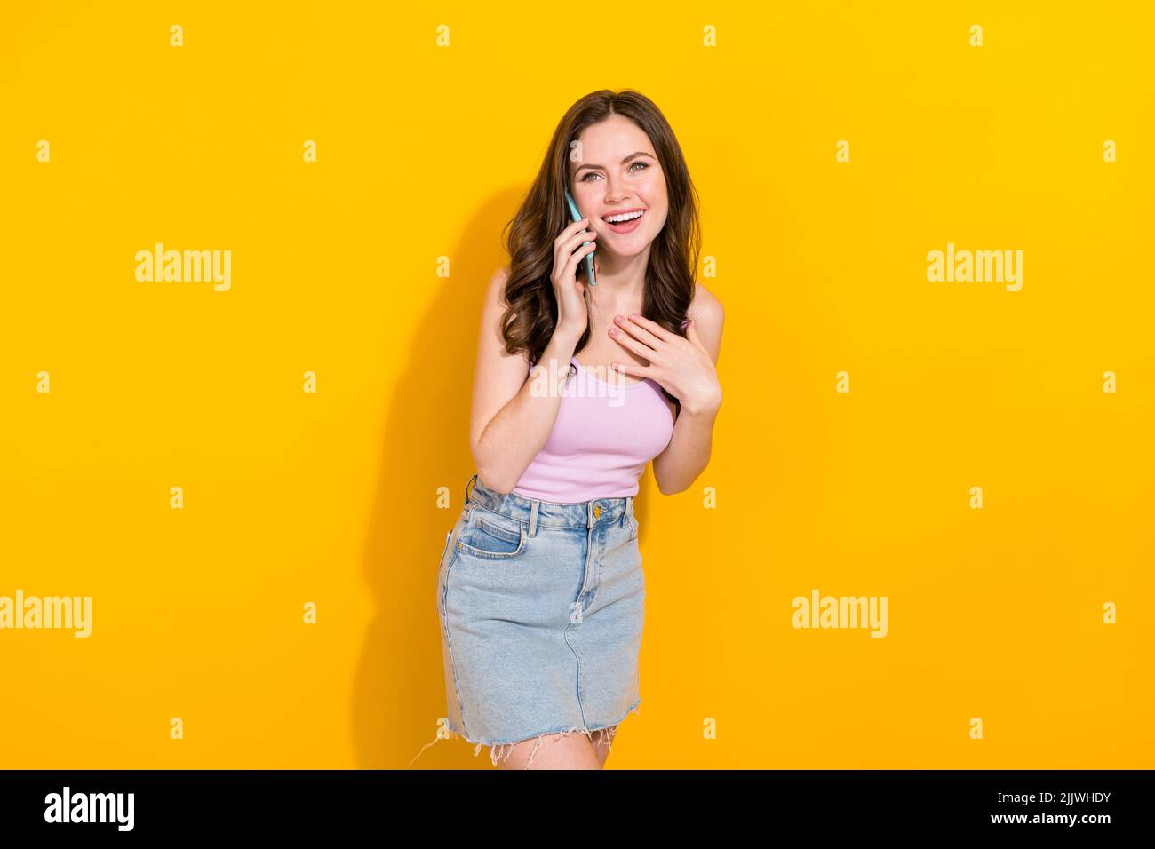 Photo of positive funky lady speak communicate telephone laugh isolated ...