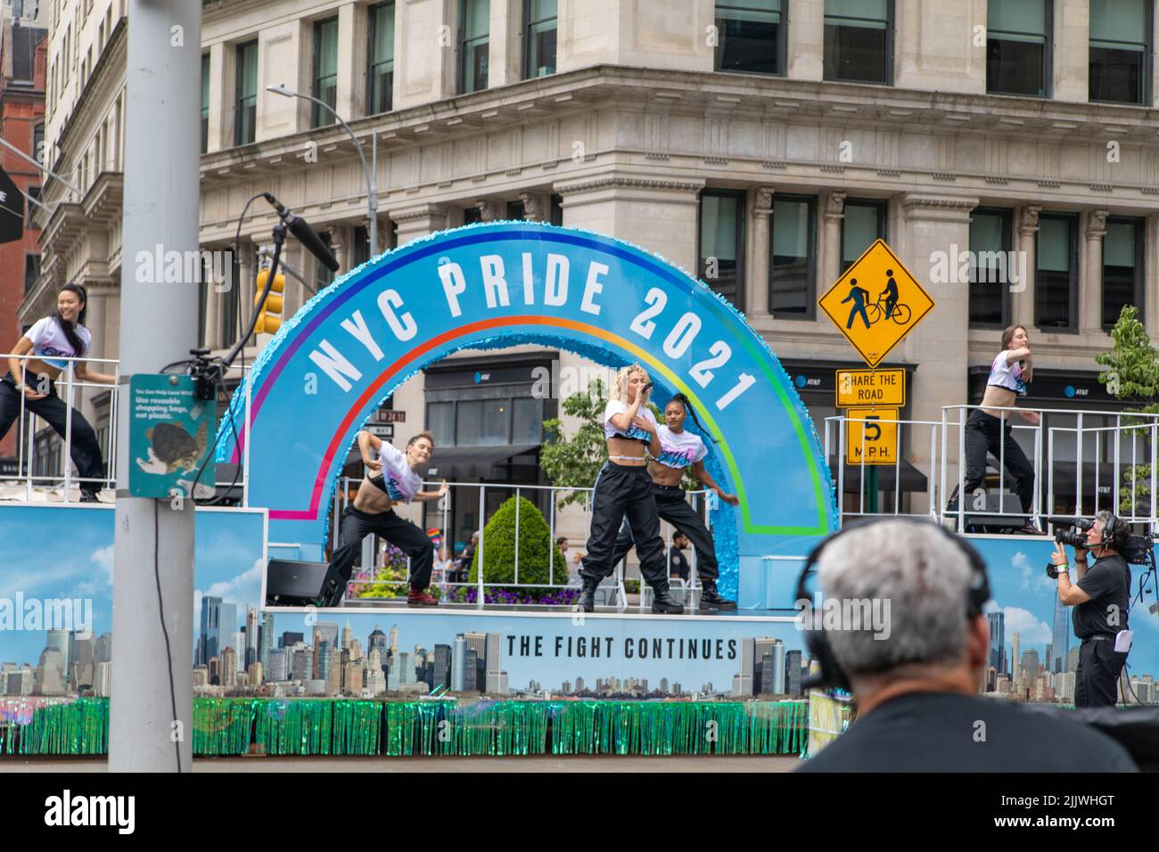 A singer performing live at the Pride Month Parade 2021 on the streets ...