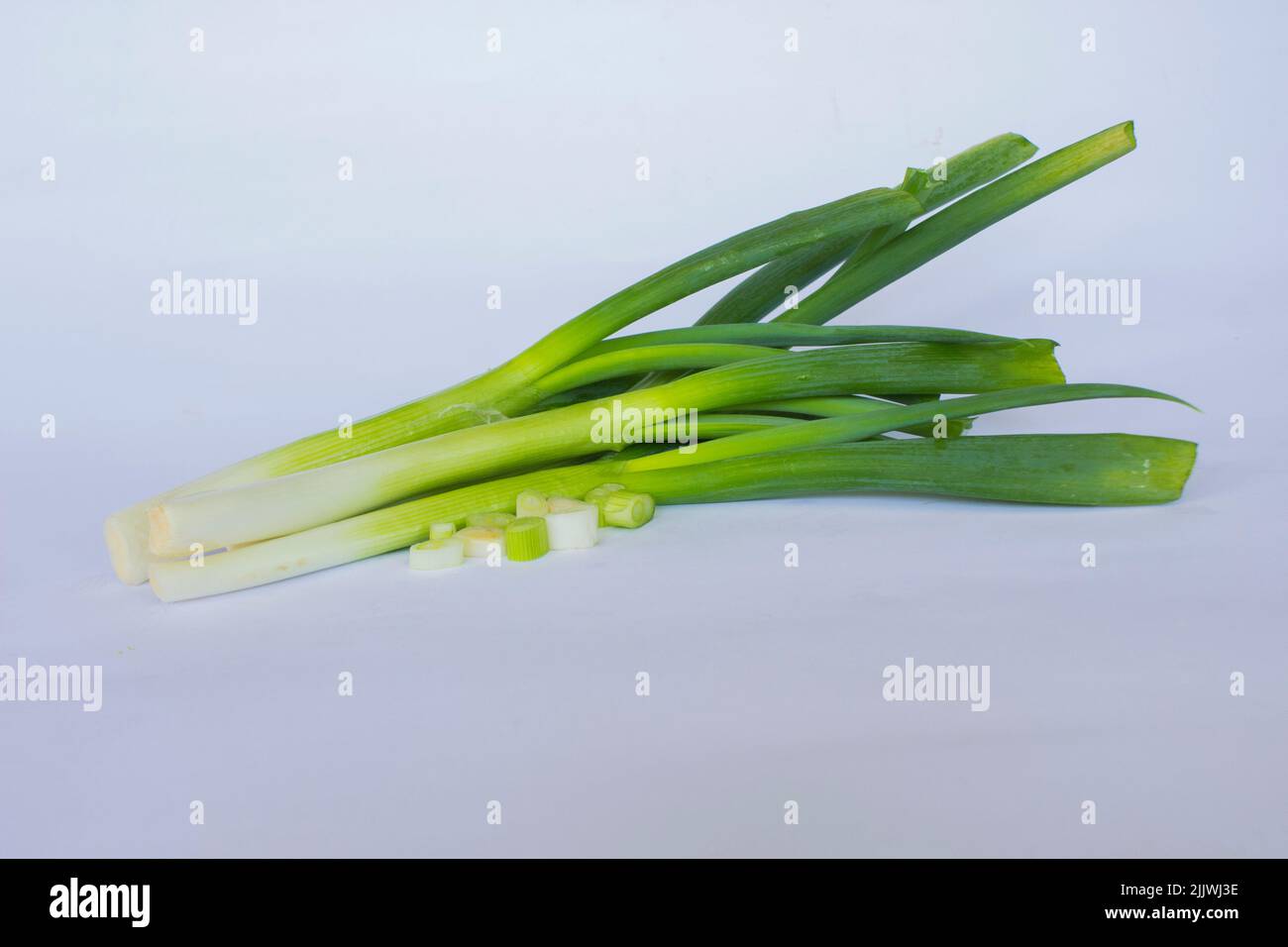 raw organic leek and leek slice isolated on white background Stock ...