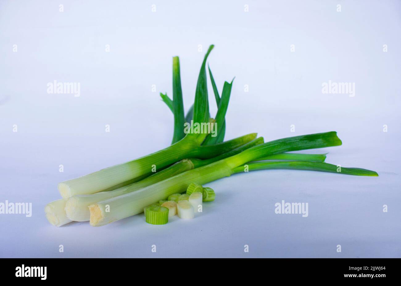 raw organic leek and leek slice isolated on white background Stock ...