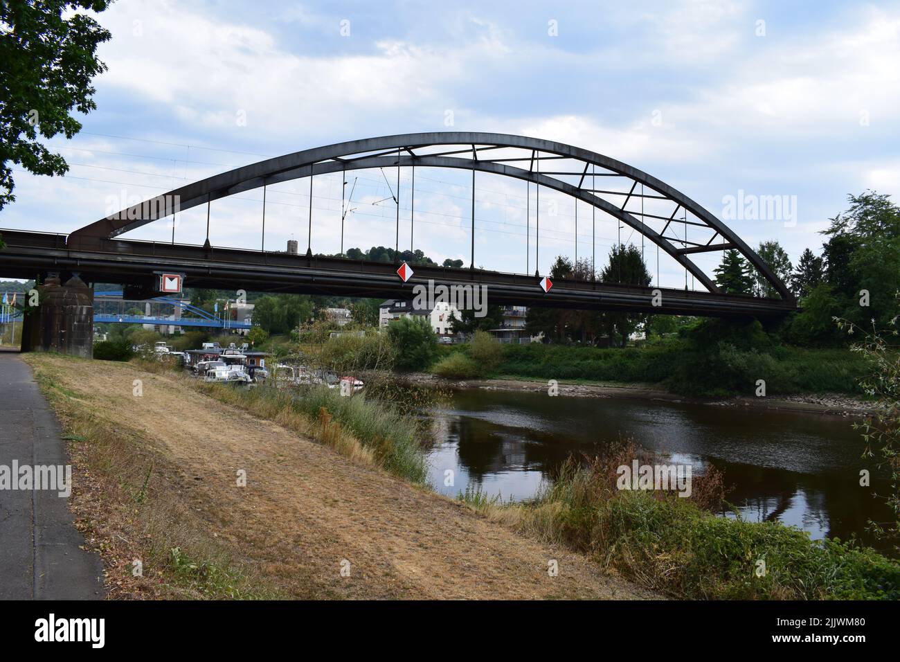 old railroad bridge built from stone and iron Stock Photo - Alamy