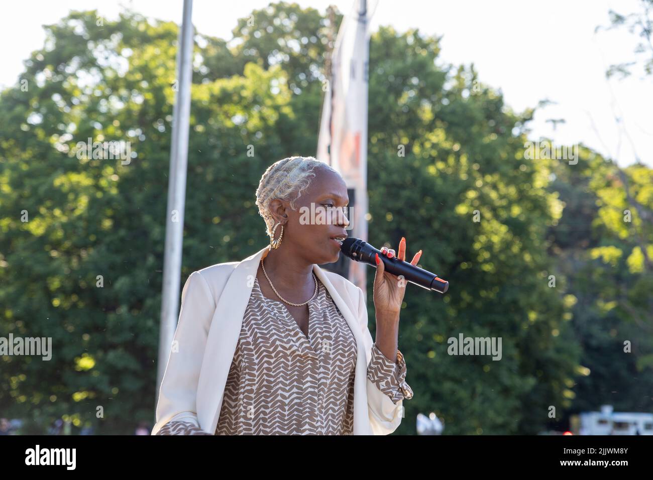 A closeup portrait of a singer at the 13th Annual Juneteenth ...