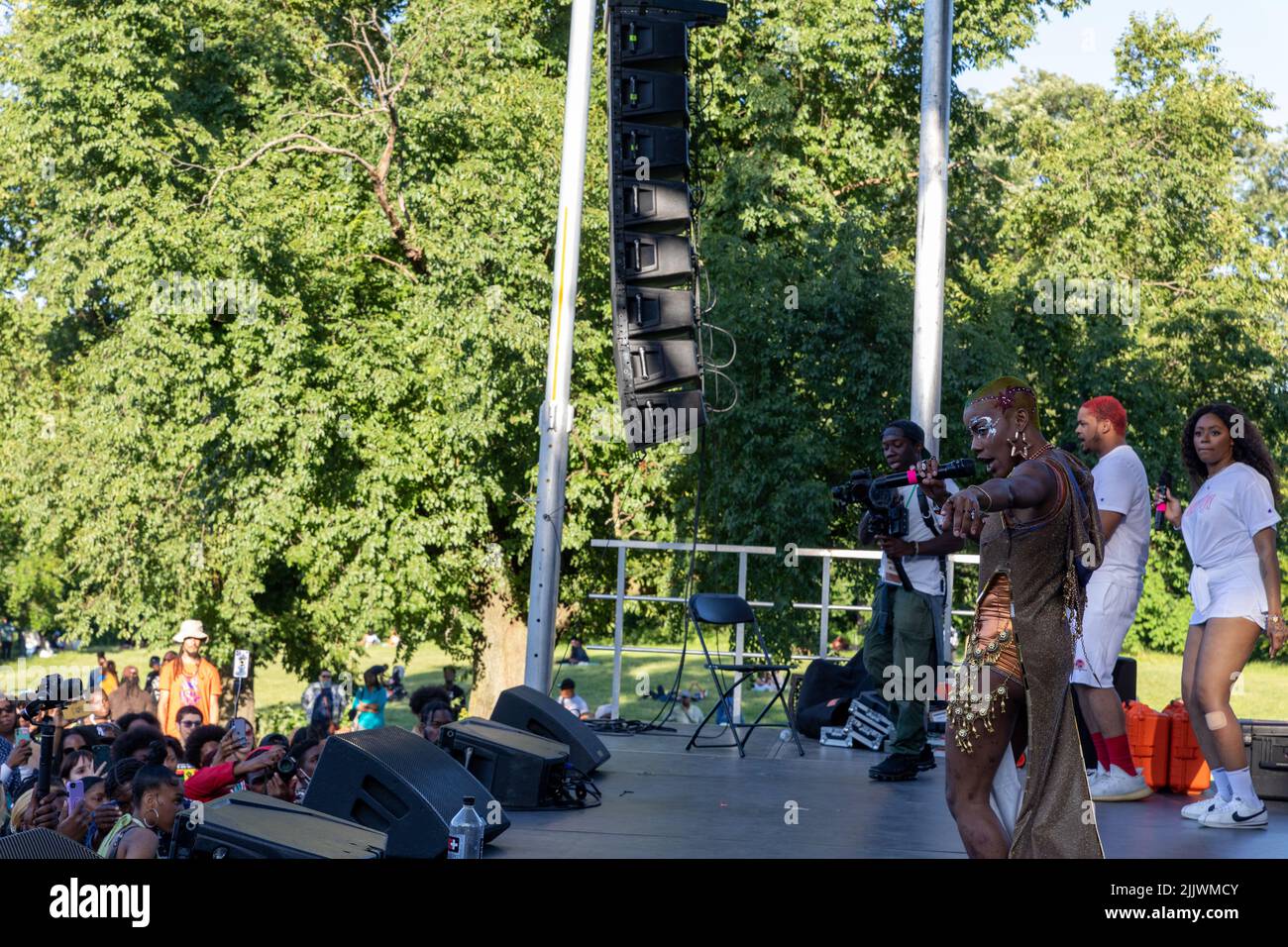 A closeup shot of a singer at the 13th Annual Juneteenth celebration in ...