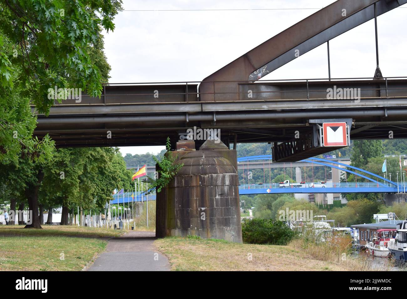 old railroad bridge built from stone and iron Stock Photo - Alamy